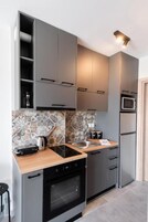 Apartamento Deluxe, vista para o mar | Cozinha privada