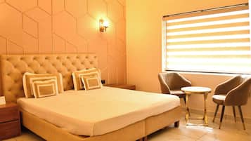 Quarto solteiro luxo, vista para o jardim | Espaço de trabalho para notebook, Wi-Fi de cortesia