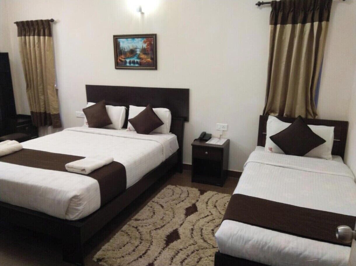 Quarto Triplo Deluxe | Quartos insonorizados, Wi-fi grátis 