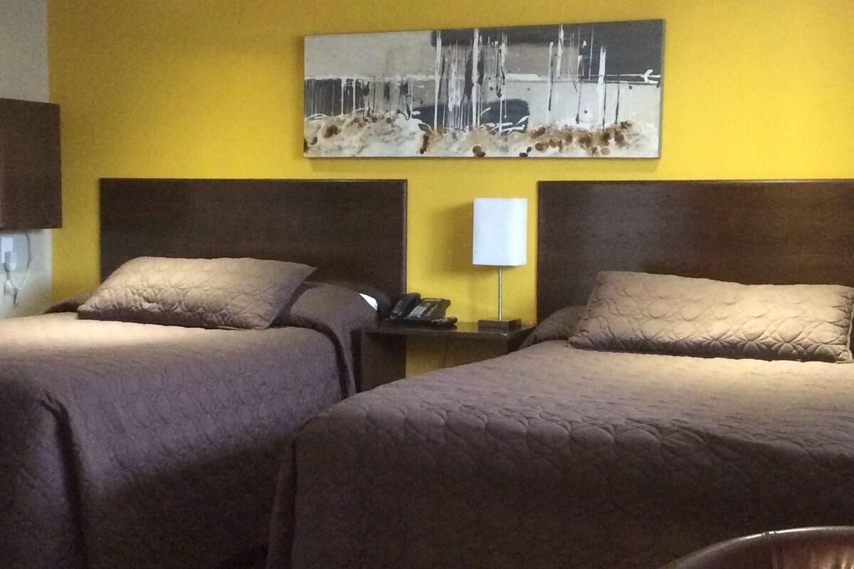 Quarto Quádruplo Deluxe, varanda | Ferro/tábua de engomar, Wi-fi grátis 