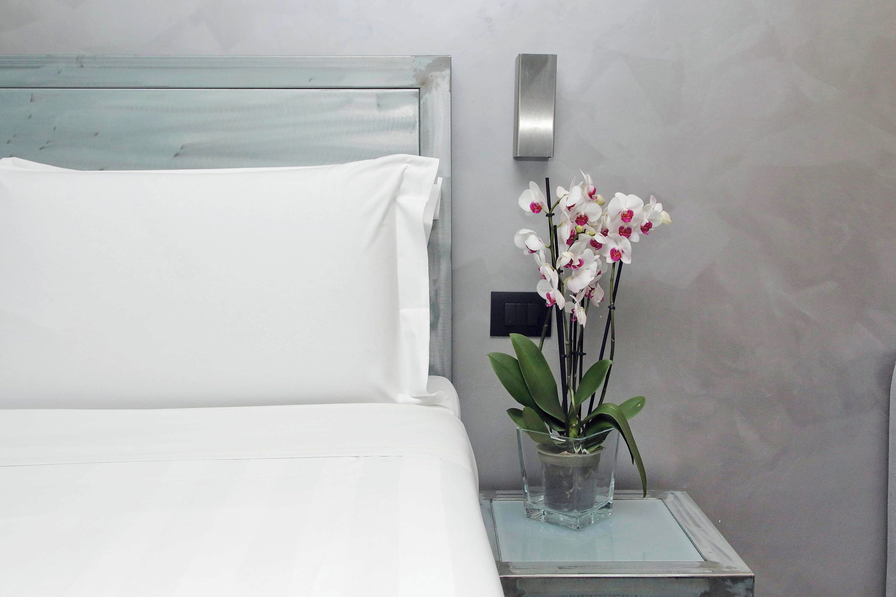 Suíte, vista para a cidade | Frigobar, cofres nos quartos, escrivaninha, berços grátis