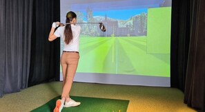 Campo de treino de golfe coberto