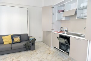 Estúdio, vista para o mar | Área de estar