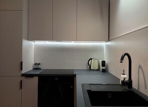 Apartamento Comfort, varanda, vista para o pátio | Cozinha privada