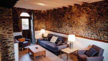 Casa Deluxe, pátio, vista para o jardim | Sala de estar