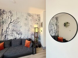 Apartamento conforto, 1 quarto | Área de estar