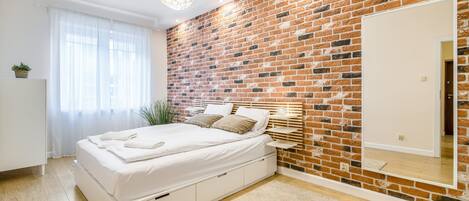 Apartamento conforto, vista para a cidade | Cortinas blackout, ferros/tábuas de passar roupa, Wi-Fi de cortesia