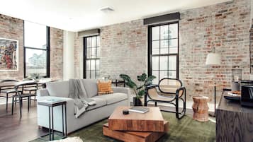 Apartamento, 1 quarto | Sala de estar | Televisor