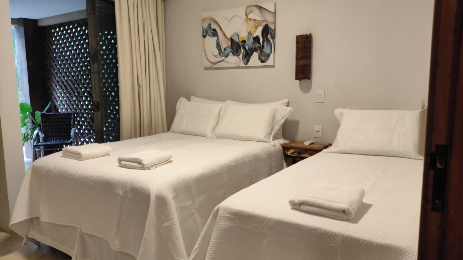 Quarto triplo, vista para o jardim | Wi-Fi de cortesia