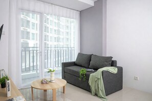 Apartamento standard | Área de estar