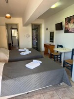 Quarto Triplo, varanda, vista para o jardim | Wi-fi grátis 