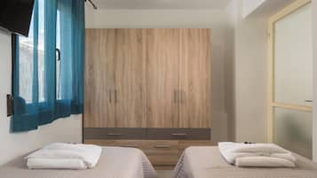 Apartamento, varanda, vista para o mar | Cofre no quarto, quartos insonorizados, Wi-fi grátis