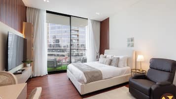 Estúdio de Luxo, varanda, Vista para a cidade | Ferro/tábua de engomar, berços/camas para crianças, Wi-fi grátis