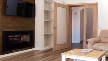 Vila família | Área de estar | TV LCD 43 polegadas com canais a cabo, impressoras