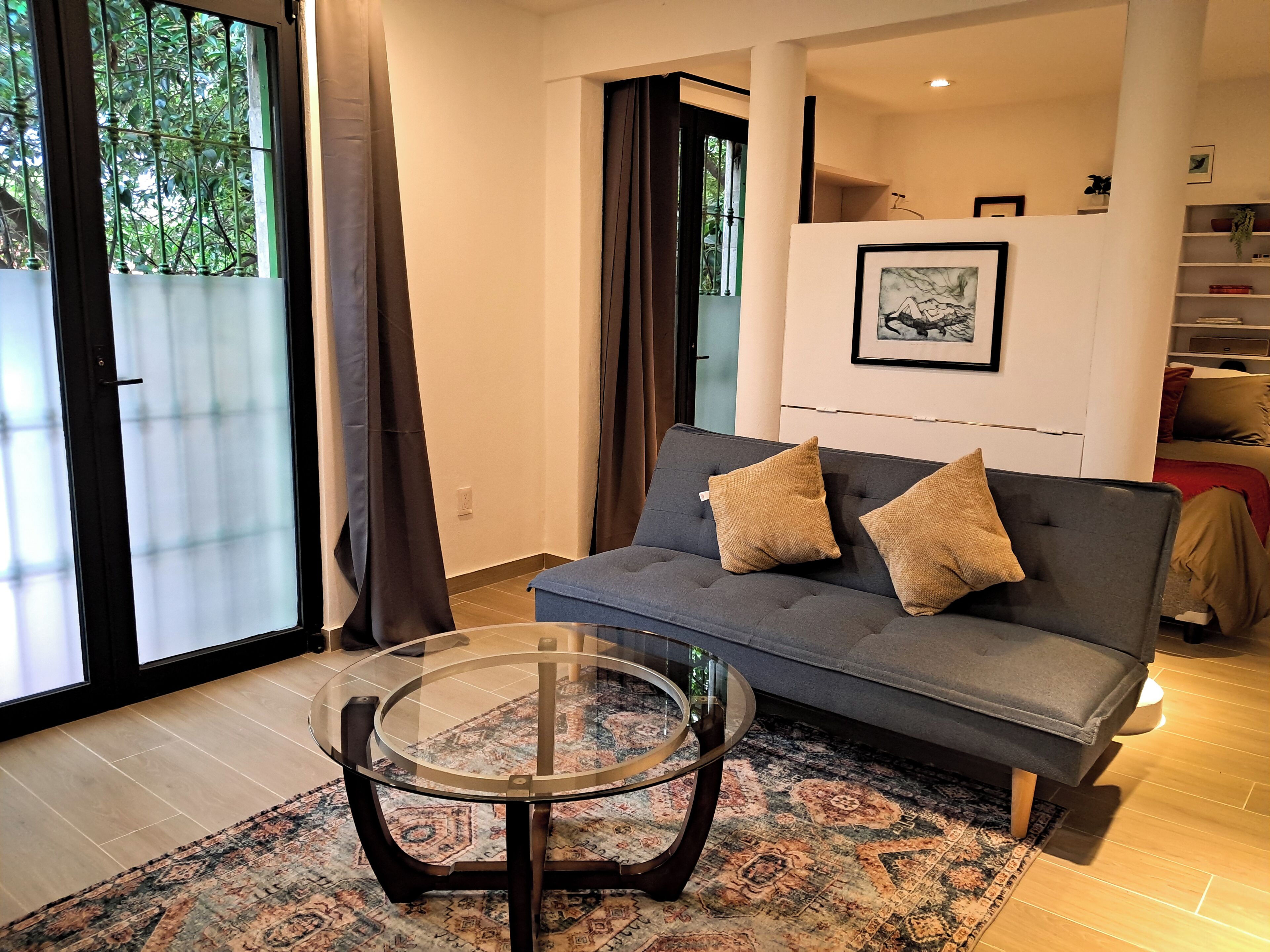 Suíte luxo, vista para a cidade | Área de estar