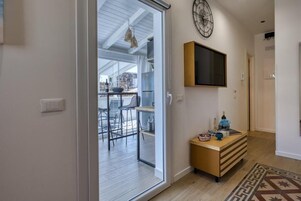 Apartamento panorâmico, 1 quarto, cozinha, vista para o mar | Parte interna