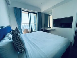 Quarto com design assinado, 2 quartos, vista para o oceano | Roupas de cama premium