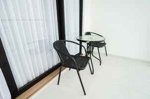 Quarto casal executivo, vista para o lago | Terraço/pátio