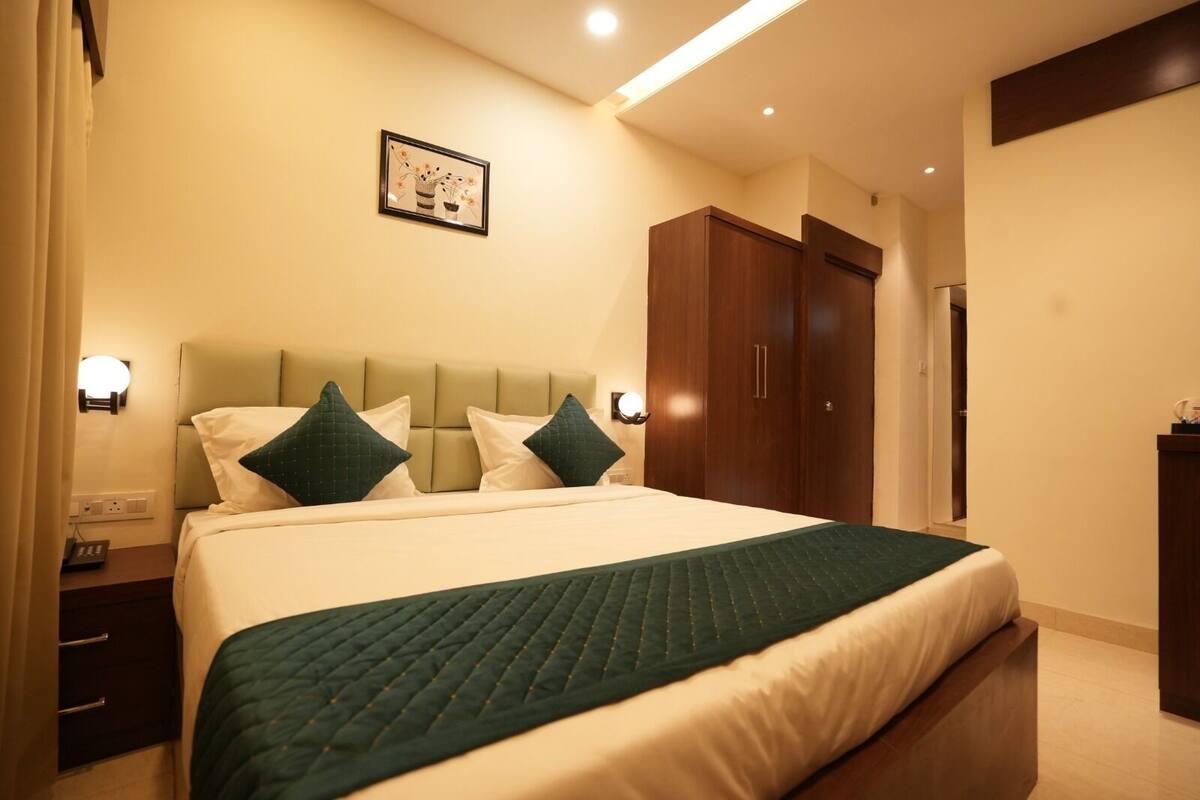 Quarto Duplo Deluxe, Vista para a cidade | Ferro/tábua de engomar, Wi-fi grátis