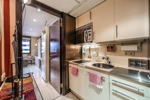 Estúdio standard, vista para a cidade | Cozinha privada