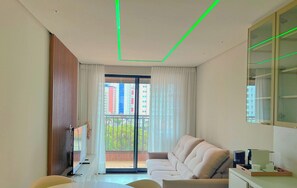 Apartamento conforto | Área de estar | TV