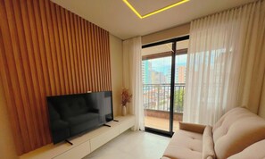 Apartamento conforto | Área de estar | TV
