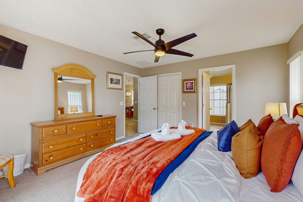 Inviting pool home with tranquil pond view near theme parks ...