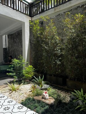 Quarto casal ou duplo luxo, sacada, vista para o jardim | Área da propriedade