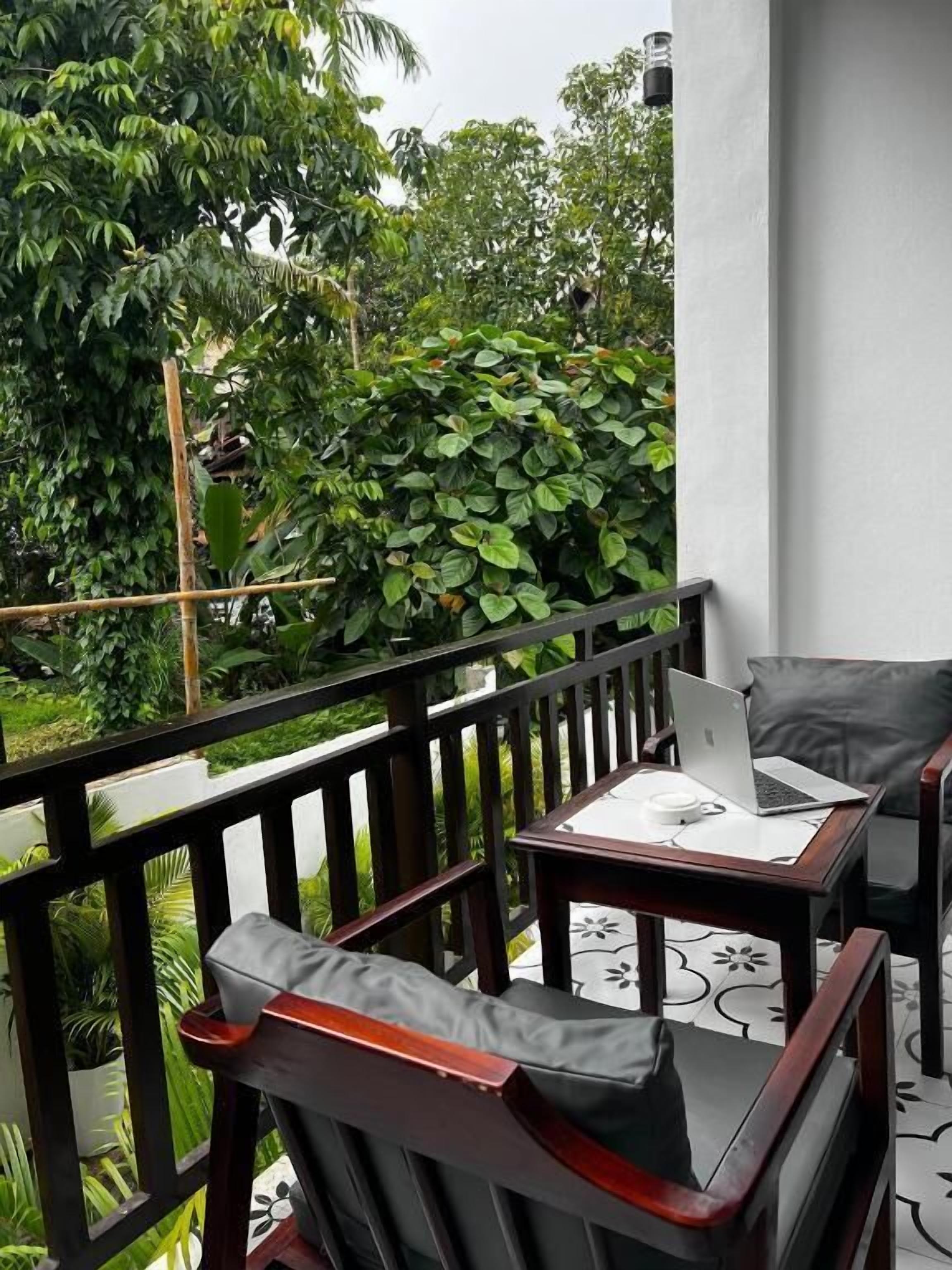 Quarto Duplo Deluxe, varanda, vista para o jardim | Terrenos do alojamento