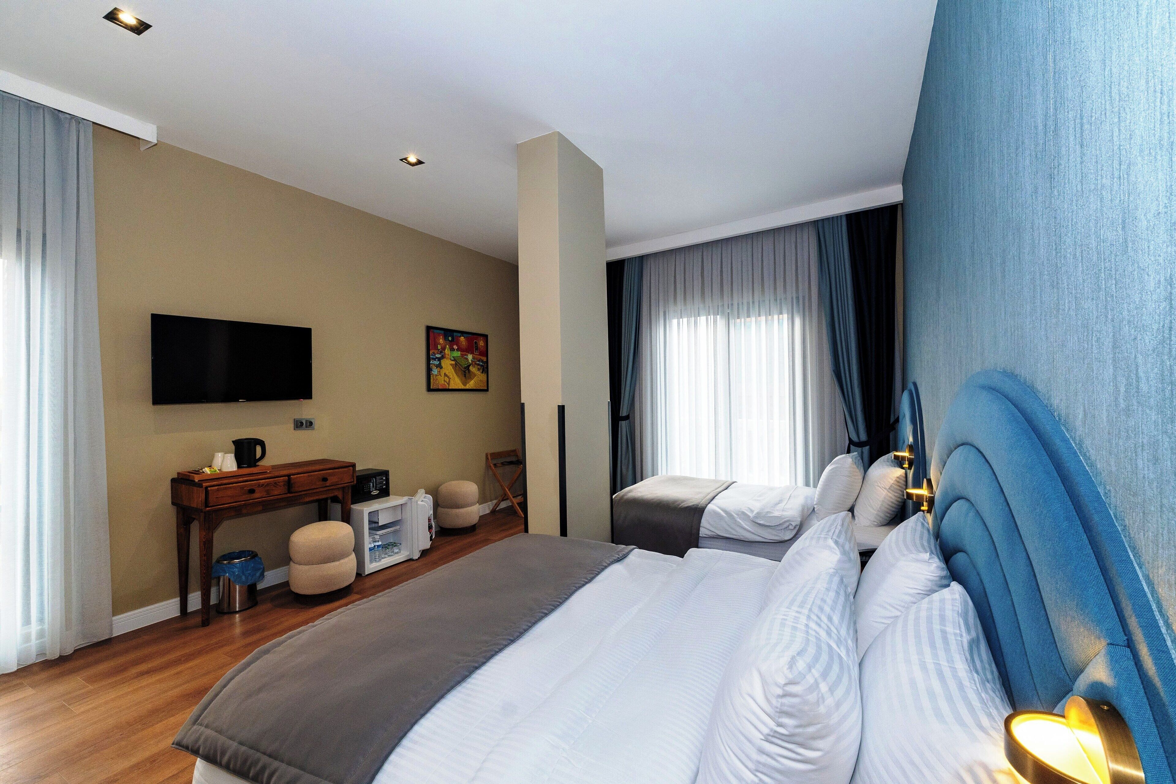 Deluxe Family Balkonlu Oda | Lençóis de algodão egípcio, roupa de alta qualidade, edredões de penas 