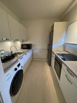 Apartamento, vários quartos, varanda | Lavandaria