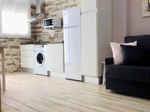 Apartamento | Cozinha privada | Produtos de limpeza 