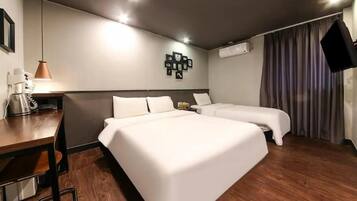 Quarto Twin, vista parcial para o oceano | Wi-fi grátis, roupa de cama fornecida, acesso para cadeira de rodas