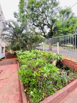 Apartamento família, vista para o jardim | Área da propriedade