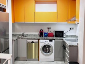 Apartamento, Vista para a cidade | Cozinha privada