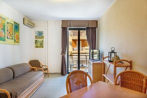Apartamento, 1 quarto, varanda, Vista para a cidade | Sala
