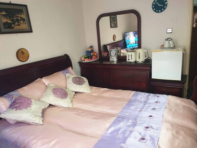 Room-ensuite Bedroom With Private Toilet