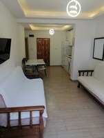 Apartamento clássico, vista para o jardim | Área de estar