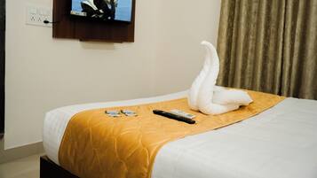 Quarto Deluxe, ar condicionado | Secretária, secretária adequada para computadores portáteis