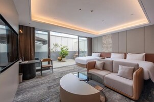 Quarto triplo superluxo, vista para a cidade | Parte interna