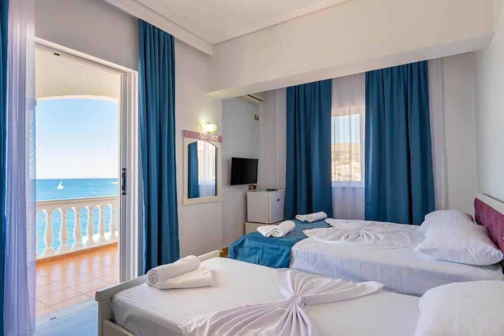 Quarto Triplo, varanda, vista para o mar | Wi-fi grátis 