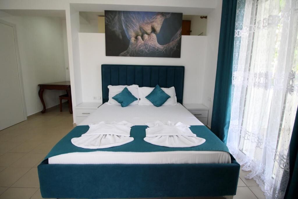 Quarto Quádruplo Standard, vista para o jardim | Wi-fi grátis 