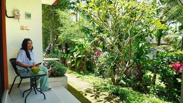 Quarto Duplo Deluxe | Vista para o jardim