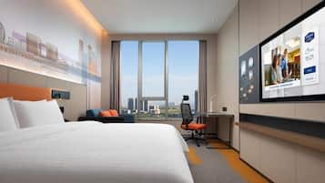 Quarto casal superior, vista para o rio | Roupas de cama premium, frigobar (abastecido com itens grátis)