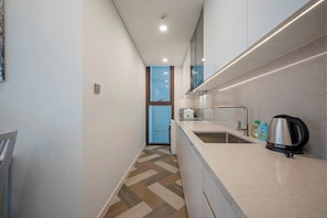 Apartamento luxo, 1 quarto, sacada | Parte interna