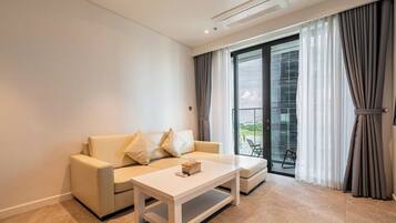 Apartamento Deluxe, 1 quarto, varanda | Vista para a cidade