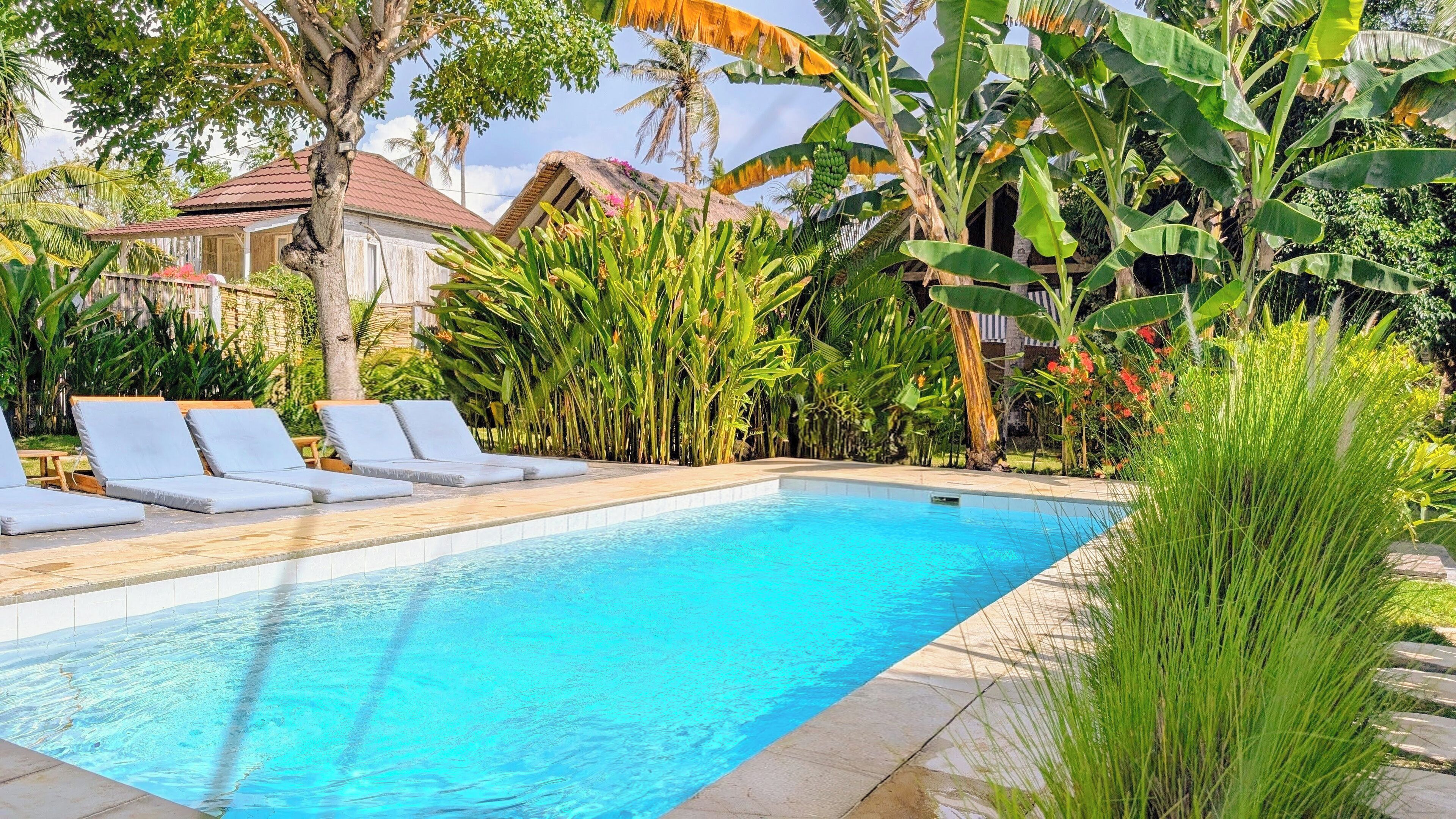 Quarto triplo clássico, vista para o jardim | Vista do quarto