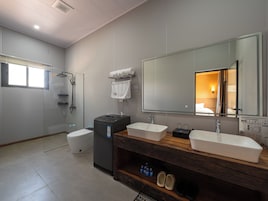 Quarto solteiro superluxo, varanda coberta | Banheiro