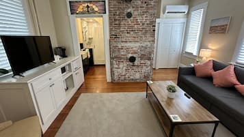 Apartamento, 1 quarto | Sala de estar