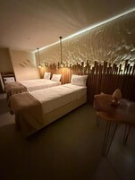 Quarto Triplo Comfort, vista para o pátio